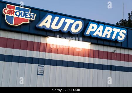 A logo sign outside of a Carquest Auto Parts retail store location in ...