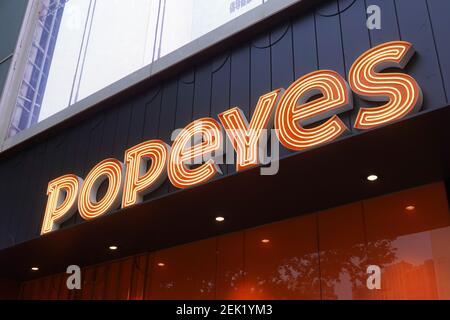 The façade and logo of the China's first flagship store of Popeyes, an ...
