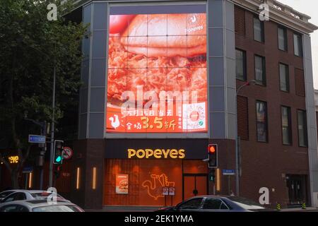 The façade and logo of the China's first flagship store of Popeyes, an ...