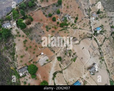 The house in the cliff village, Atulieer village, Zhaojue county ...
