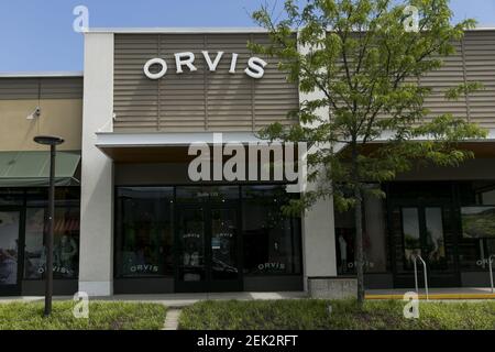 A logo sign outside of a Orvis retail store location in Charlottesville ...