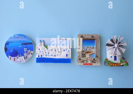 Four fridge magnets representing the Greek islands of Paros, Naxos ...