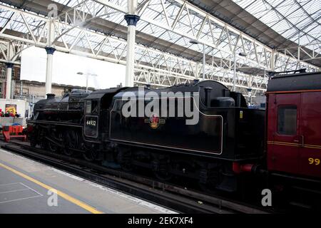 steam locomotive number 44932 at London Waterloo station with a tourist ...