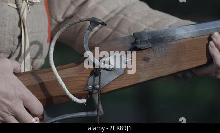Medieval handgunner fires his matchlock musket Stock Photo - Alamy