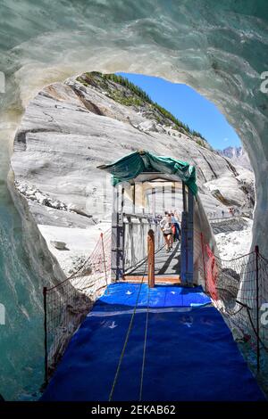 People visit the Chamonix Ice Cave is a cave excavated every year in ...
