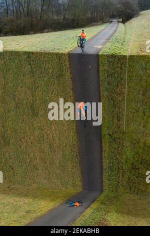Composition of man on bike, male swimmer and male runner, over sunset and sea Stock Photo - Alamy