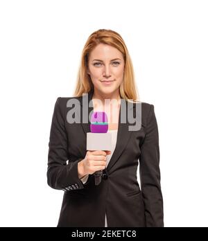 Portrait of female journalist with microphone pointing at something on ...