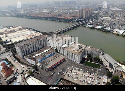 An aerial view of various factories located at a local industrial zone ...