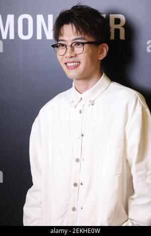 Chinese singer and Internet celebrity Fei Qiming smiles to customers ...