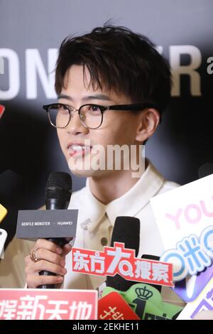 Chinese singer and Internet celebrity Fei Qiming smiles to customers ...