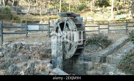 Wooden Waterwheel on Public Walkway Stock Photo - Alamy