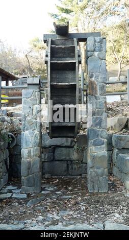 Wooden Waterwheel on Public Walkway Stock Photo - Alamy