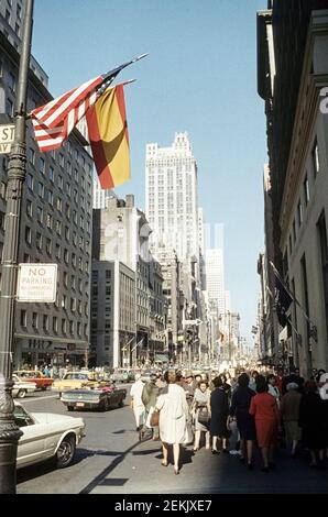 People walk on Fifth Avenue in Manhattan, New York City. (Photo by ...