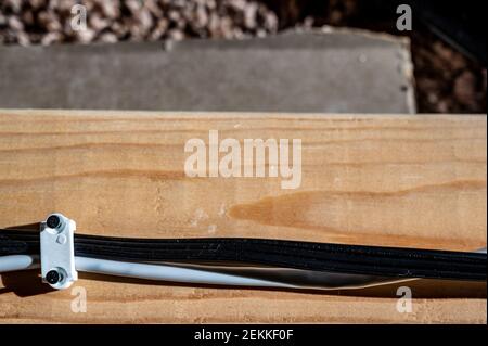 cable wire staple used to organize wires in a residential building ...