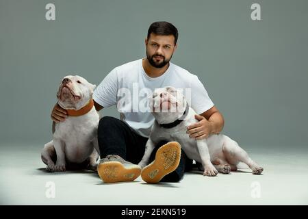 Photo of charming adorable little guy dressed orange t-shirt holding ...
