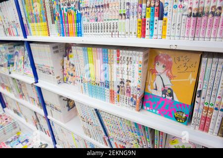 Mangas on display in a manga bookstore in Ikebukuro. Manga themed ...
