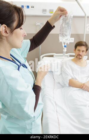 Intravenously injection young patient Stock Photo - Alamy