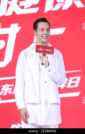 Hong Kong singer and actor William Chan, left, Chinese actress Yang Mi ...