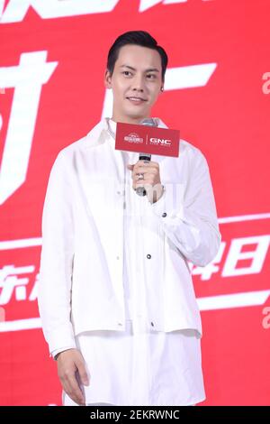 Hong Kong singer and actor William Chan, left, Chinese actress Yang Mi ...