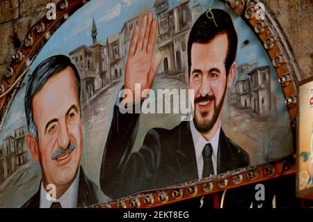 Portrait of deceased president Hafiz al Assad and his eldest son Bassel ...