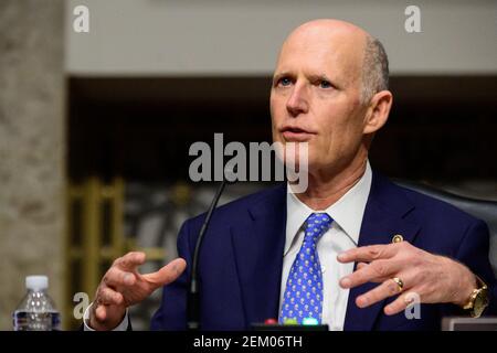 Sen. Rick Scott, R-Fla., speaks to the media after a campaign rally for ...