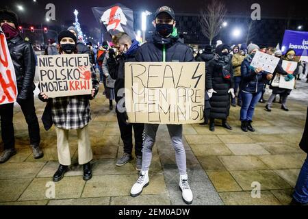 A protester with Women Are Real is seen during a protest at an annual ...