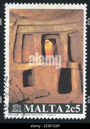 MALTA - CIRCA 1980: A stamp printed in Malta shows a historical scene ...
