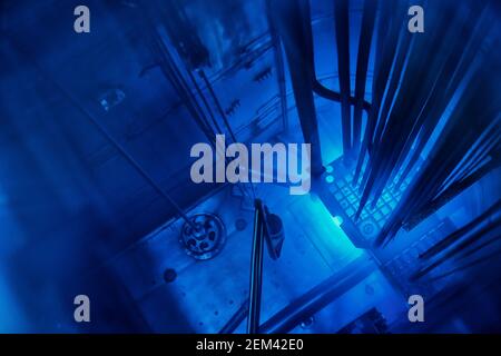 Blue glow water of nuclear reactor core powered, caused by Cherenkov ...