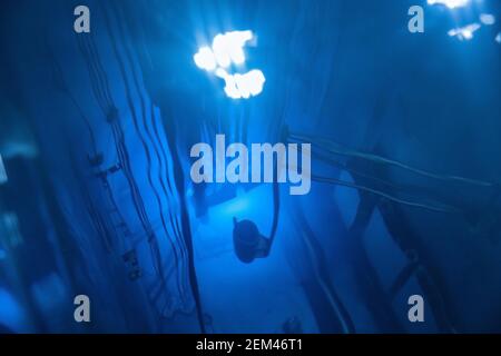 Blue glow water of nuclear reactor core powered, caused by Cherenkov ...