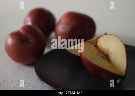The Red Bartlett pear carries a true pyriform pear shape. A rounded ...