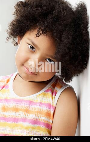 Portrait of a girl smirking Stock Photo - Alamy