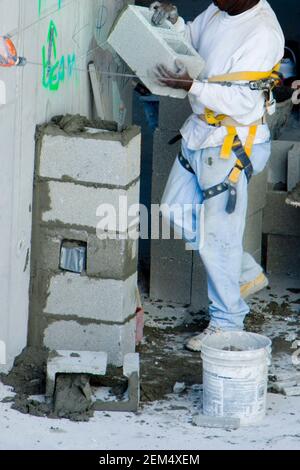 Rope is tied to a cement block. Wall Mounted Belt Barrier Stock Photo ...