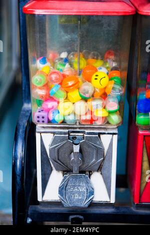 Close-up of gumball machine Stock Photo - Alamy
