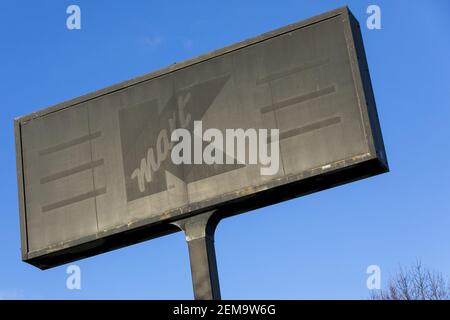 A painted over Kmart logo sign outside of a closed retail store ...