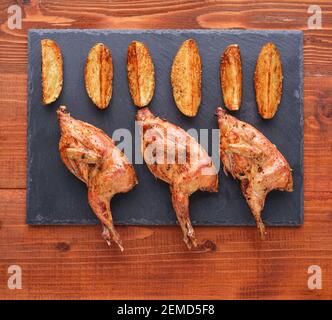 Homemade eco-friendly cooked quail Stock Photo - Alamy