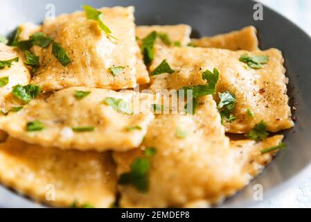 Plate with authentic ravioli Stock Photo - Alamy