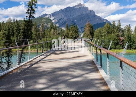 Bow River Pathway pedestrian bridge connecting downtown Calgary with ...
