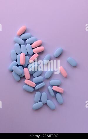 Pills over a blue background. Medicament treatment. Health care photo ...