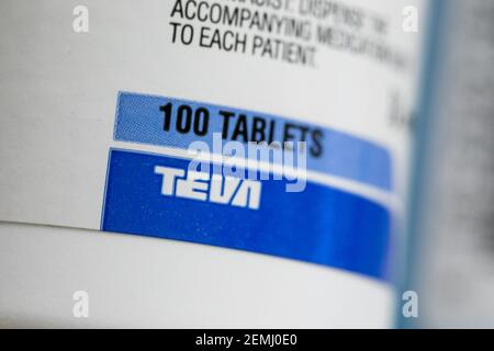 A Teva Pharmaceutical Industries logo is seen on prescription ...