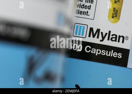 A Mylan logo is seen on prescription pharmaceutical packaging ...