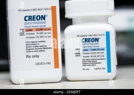 Bottles of Creon (pancrelipase) prescription pharmaceuticals ...