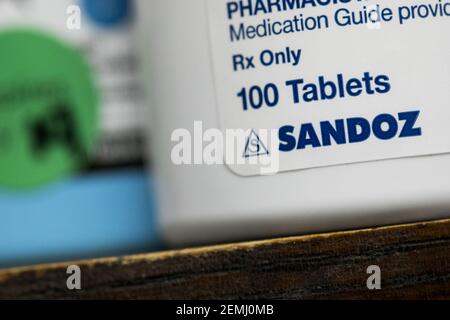 A Sandoz logo is seen on prescription pharmaceutical packaging ...