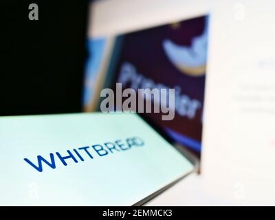 Mobile phone with website of British hospitality company PPHE Hotel ...