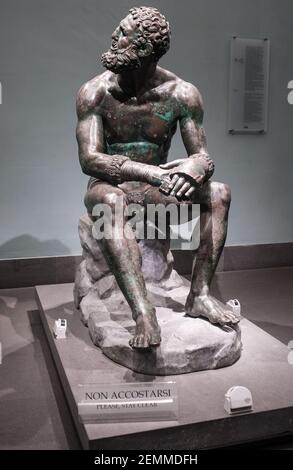 Boxer at Rest. Hellenistic Greek Sculpture. C. 330 BC. Sitting nude ...