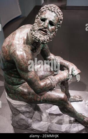 Boxer at Rest. Hellenistic Greek Sculpture. C. 330 BC. Sitting nude ...