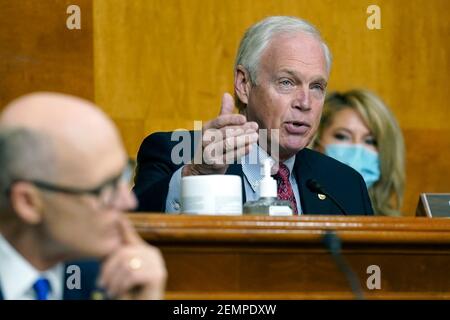 Sen. Rick Scott, R-Fla., speaks to the media after a campaign rally for ...