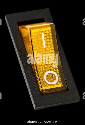 Yellow power switch at OF position, isolated on black background Stock ...