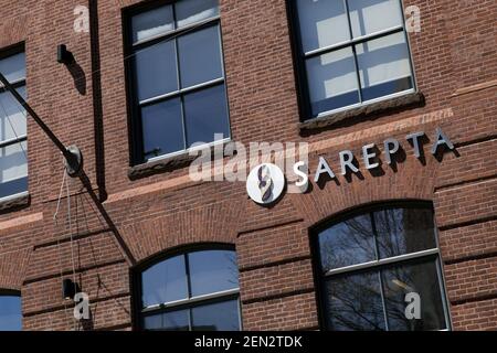 A logo sign outside of the headquarters of Sarepta Therapeutics, Inc ...