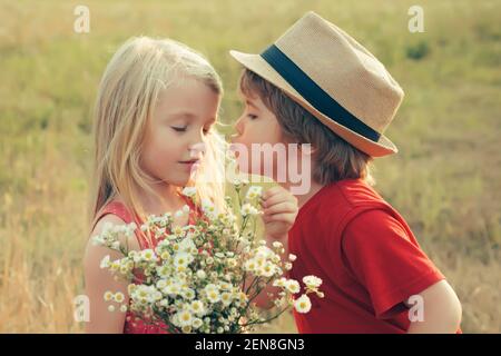 Lovely children. Kids Love story, kiss. Beautiful little couple - boy ...