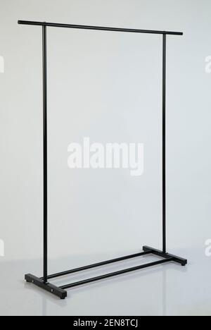 Empty cloth rack isolated on white background Stock Photo - Alamy